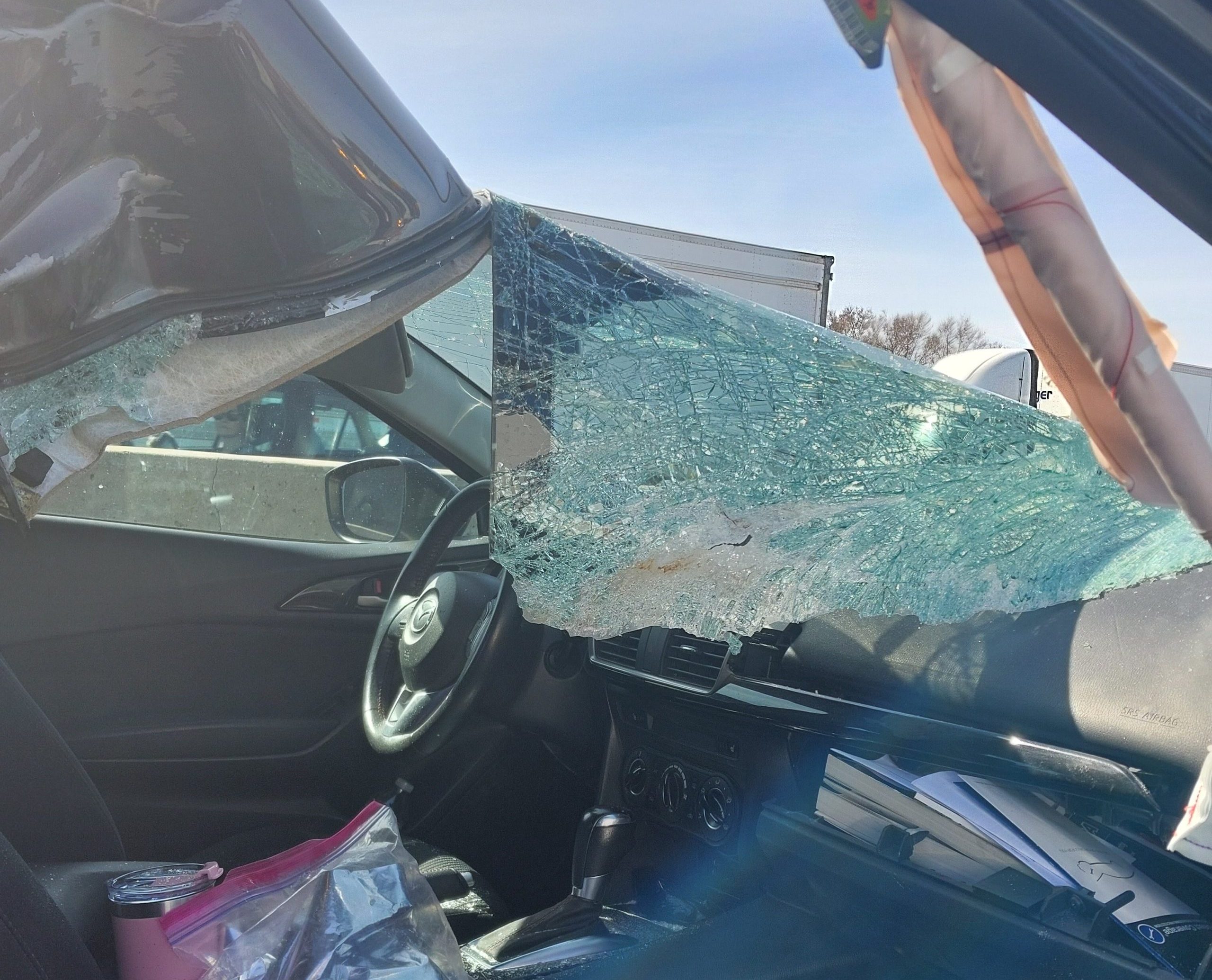 Wheel smashes through windshield on Hwy. 401 in Toronto | INsauga