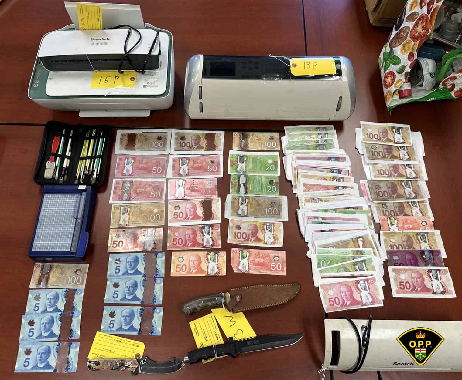 Bundles of fake cash found in car and home in Ontario town; two people ...