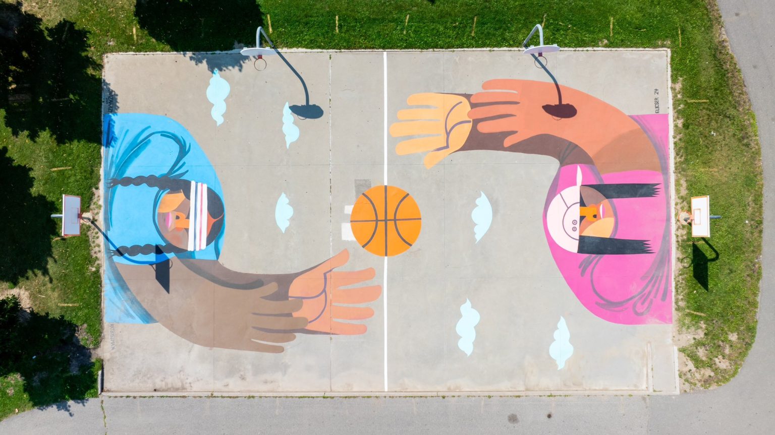 PHOTOS: Art and sport come together for new mural at basketball court ...