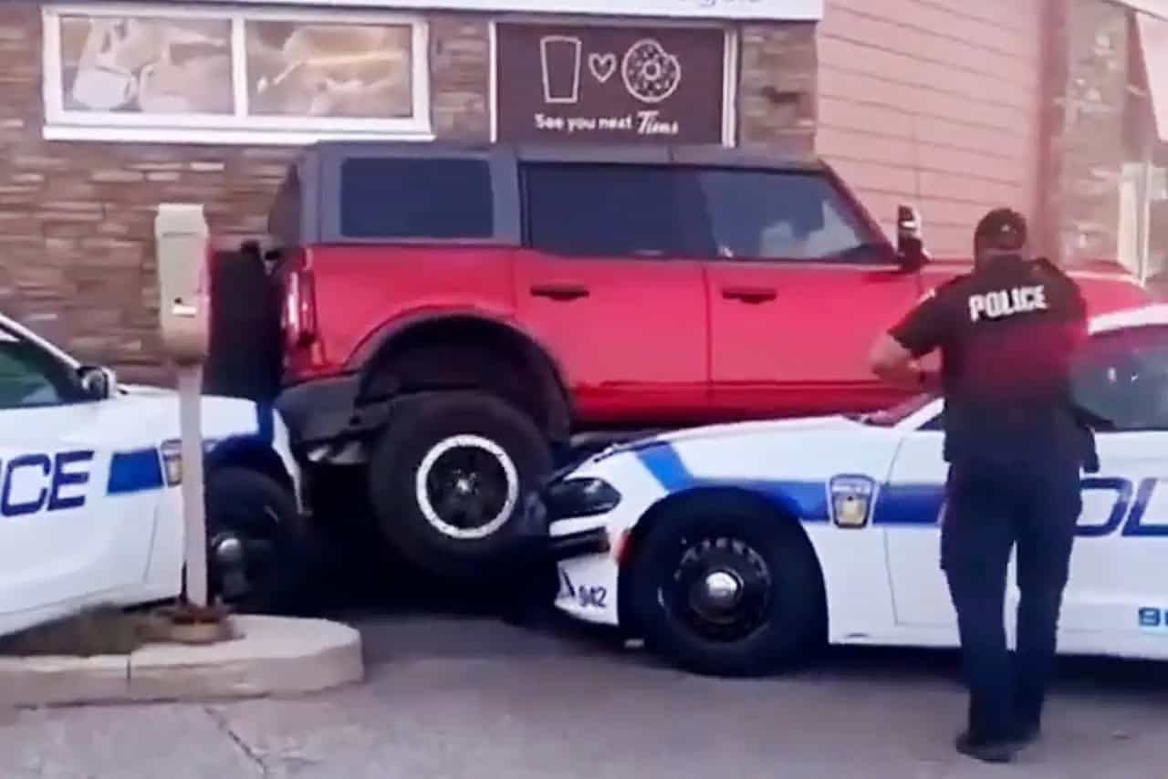 Police chief praises officers after SUV tried to plow over cruiser in ...