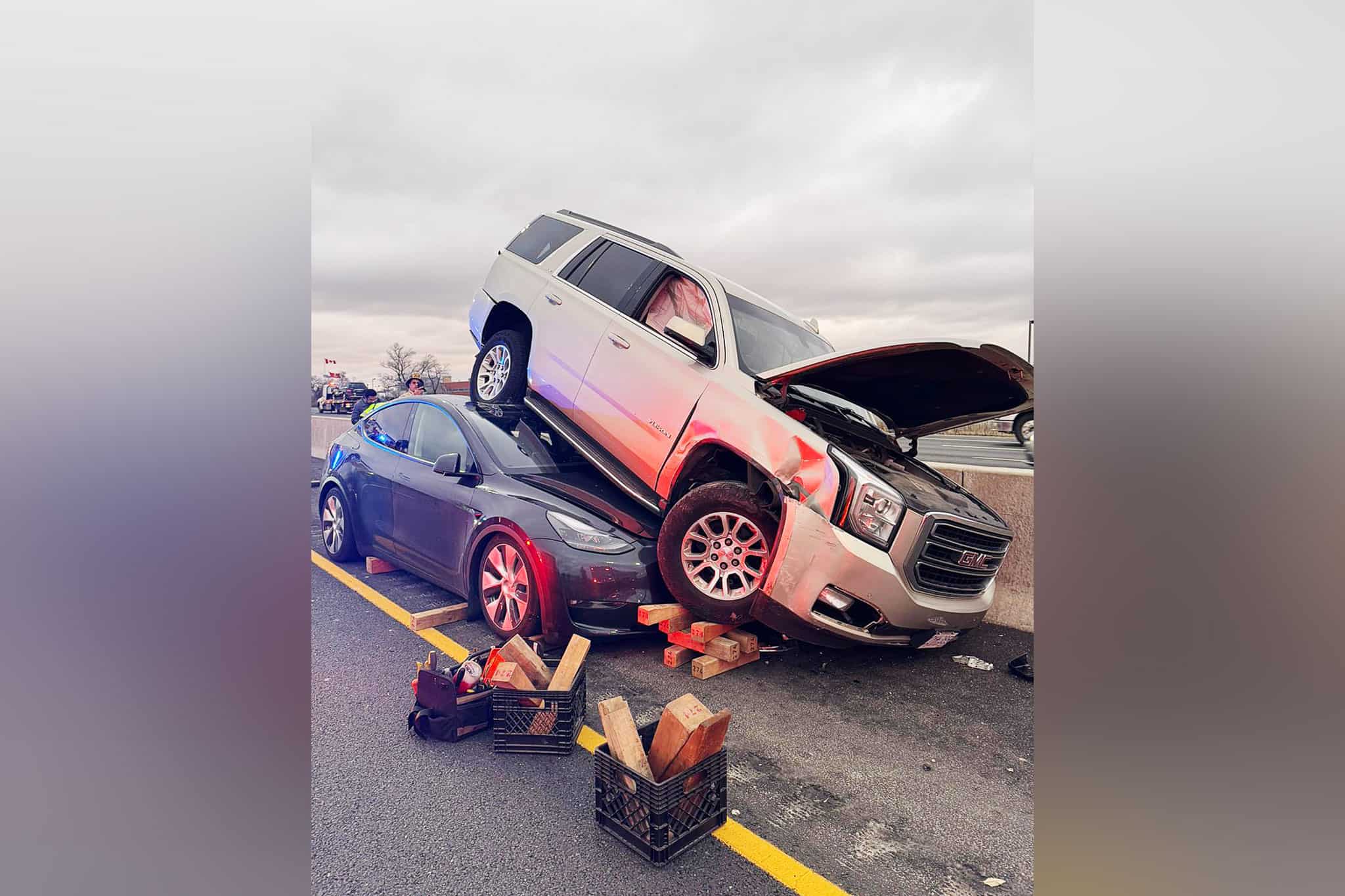 SUV runs over Tesla on the QEW in Ontario | INsauga