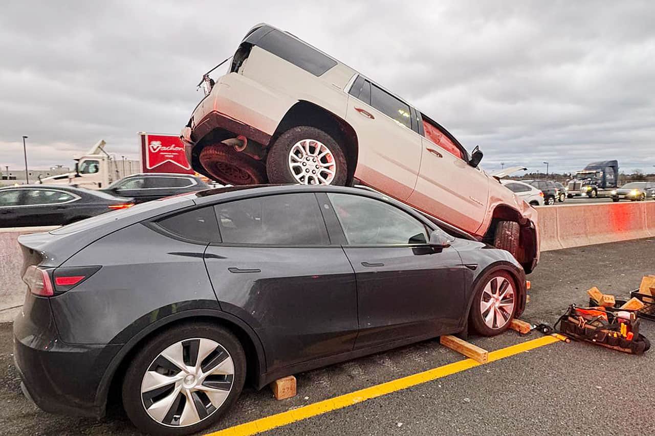 SUV runs over Tesla on the QEW in Ontario | INsauga