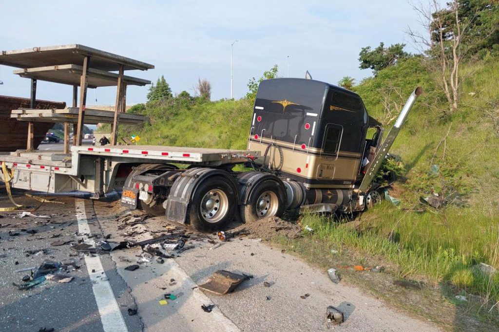 UPDATE: Transport truck crashes through median in 9-vehicle collision ...
