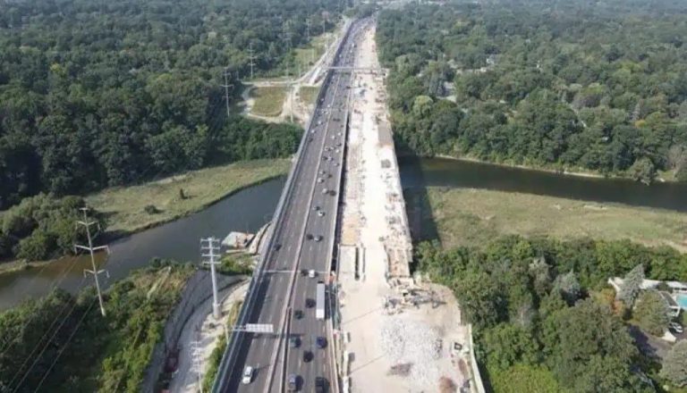 Twin bridge construction over river impacts traffic on major highway in ...