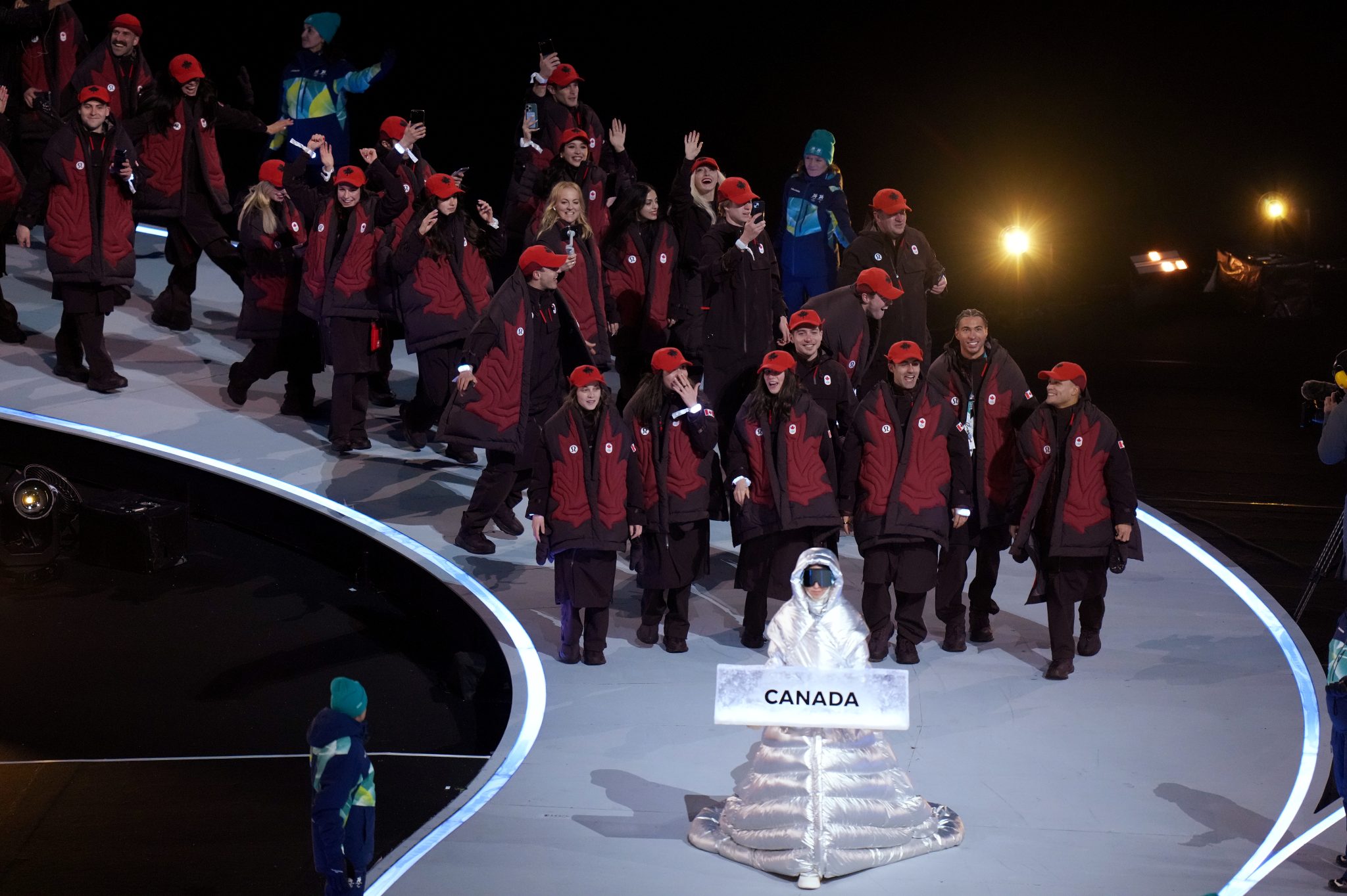 Canada marches into unique opening ceremony at Milan Cortina Olympics ...