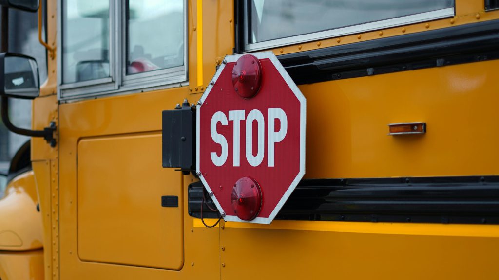 Man charged after vehicle collision involving school bus in Ontario ...